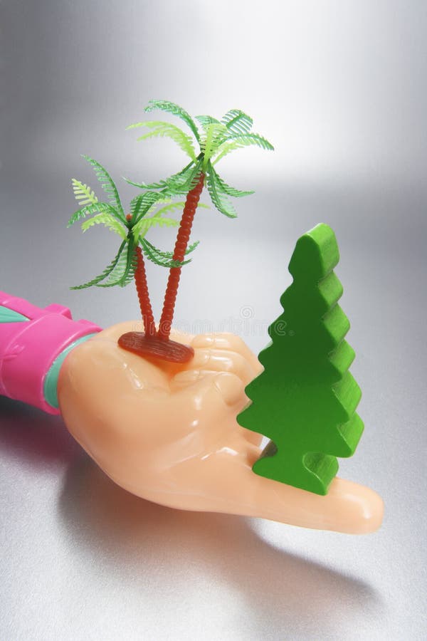 Plastic Hand with Miniature Trees Stock Photo - Image of hand, silver ...