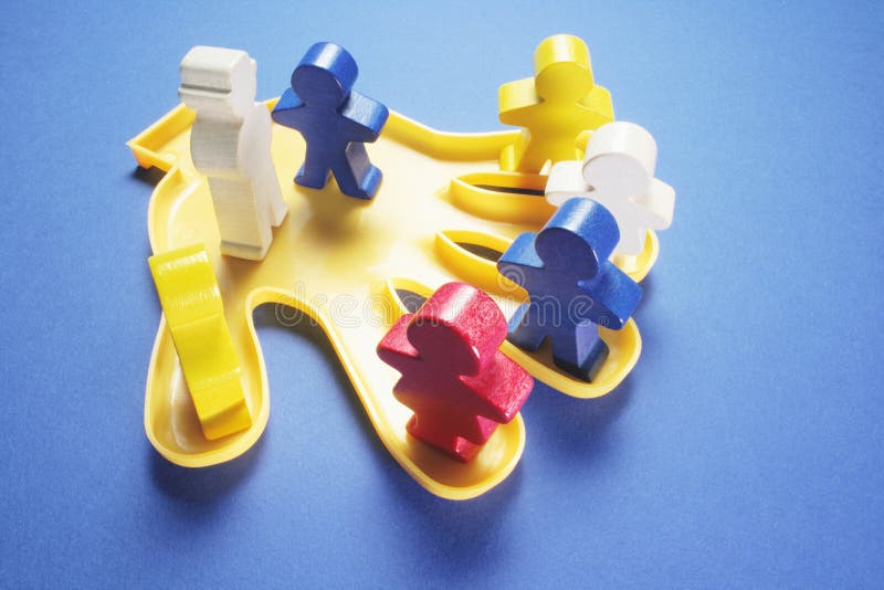Plastic Hand with Wooden Figures Stock Image - Image of craft ...