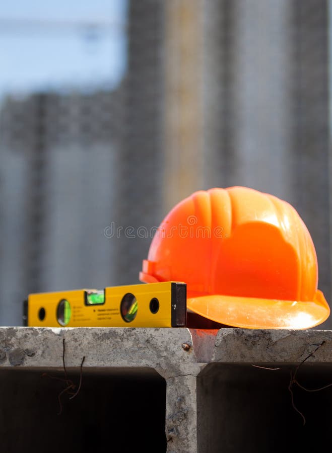 Plastic Hard Hat and Spirit Level Stock Photo - Image of accuracy ...