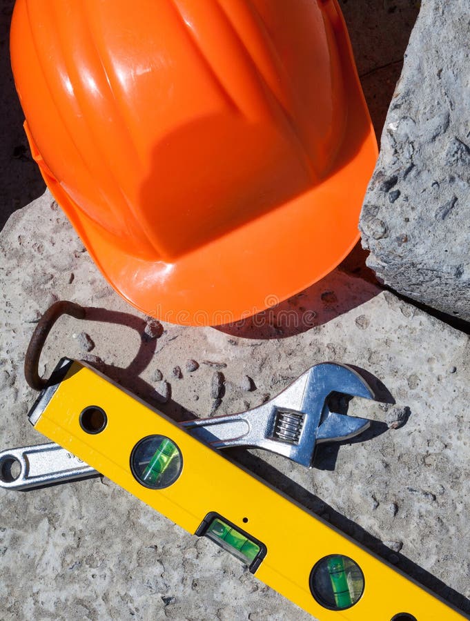 Plastic Hardhat, Spirit Level and Adjustable Spanner Stock Image ...