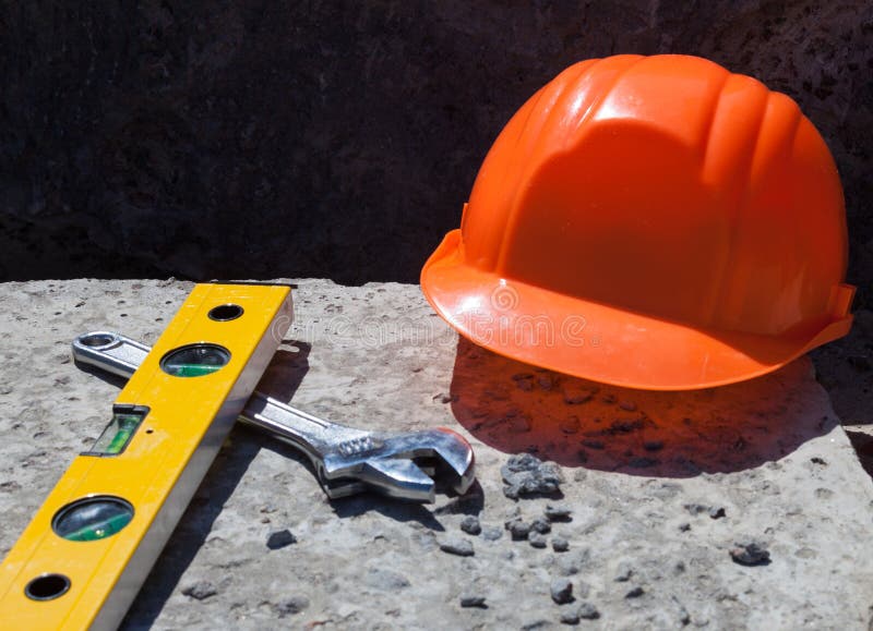 Plastic Hardhat, Spirit Level and Adjustable Spanner Stock Image ...