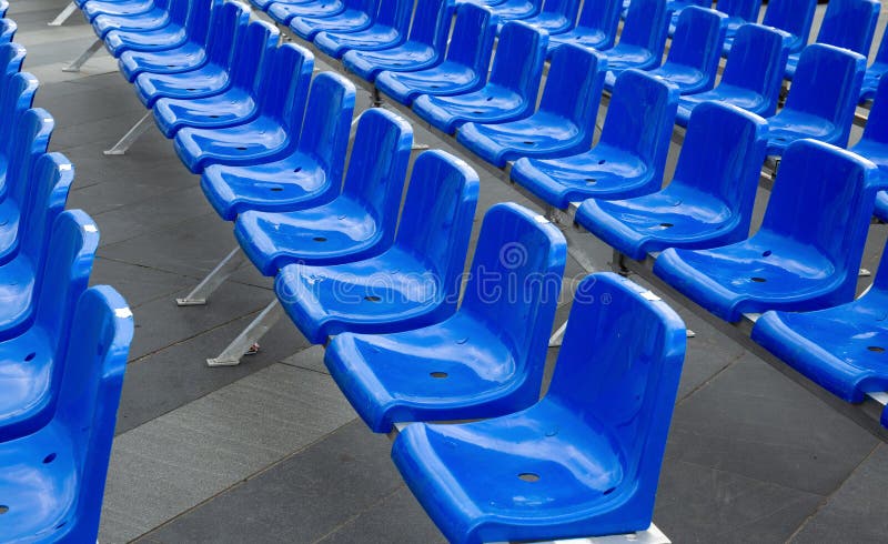 Plastic Hire Chairs in a Row Blue Color Stock Photo - Image of event ...