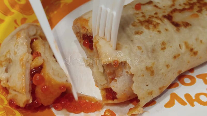 Plastic Knife and Fork Cutting Pancake with Spawn Stock Footage - Video ...