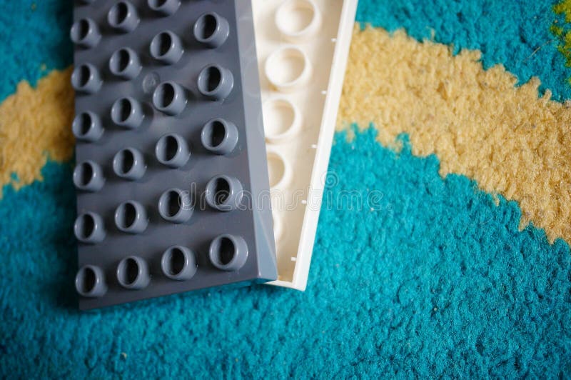 Lego Duplo Pieces on a Carpet Editorial Stock Image - Image of angle ...