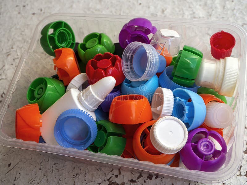 Plastic Lids are Collected in a Box for Recycling. the Concept of ...