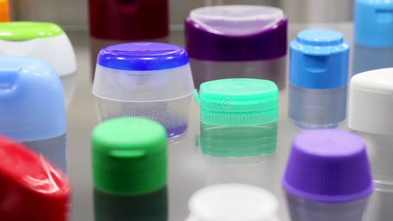 Plastic Lids of Different Shapes and Purposes in Different Colors Stock ...