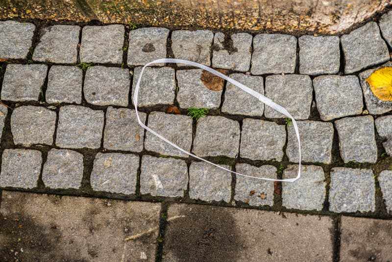 Plastic Loop Left on the Street Representing a Danger for Pedestrians ...