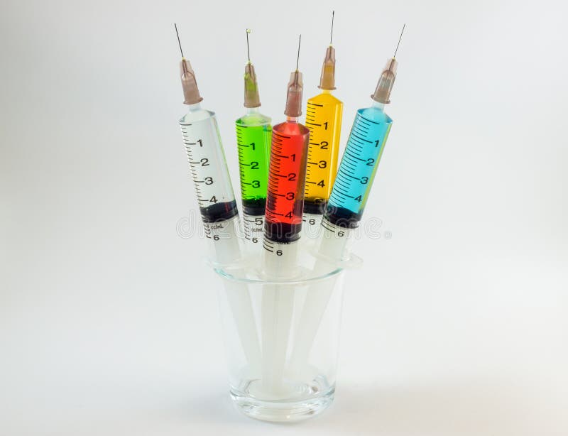 Plastic Medical Syringes Containing Multicolor Solutions with White ...