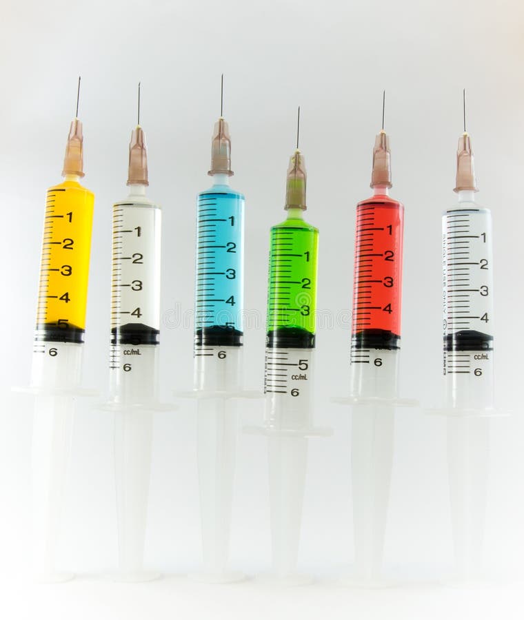 Plastic Medical Syringes Containing Multicolor Solutions with White ...
