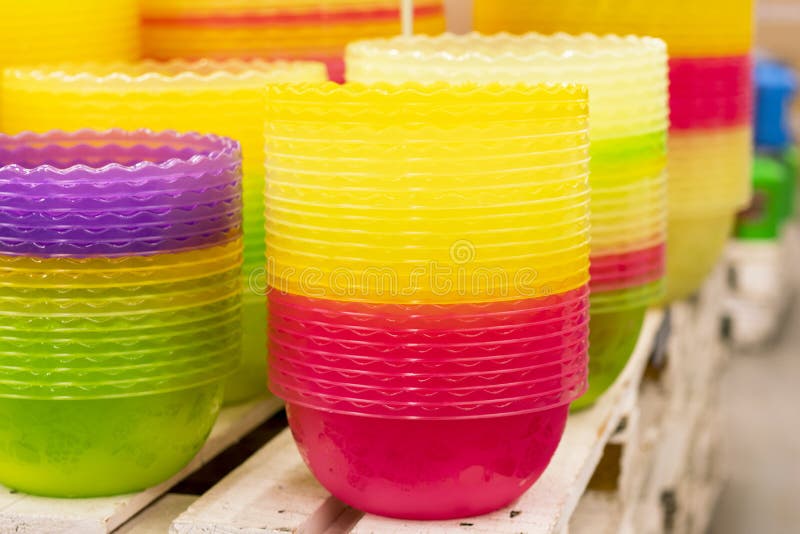 Plastic Multi-colored Bowls on the Shelf in the Store Stock Photo ...