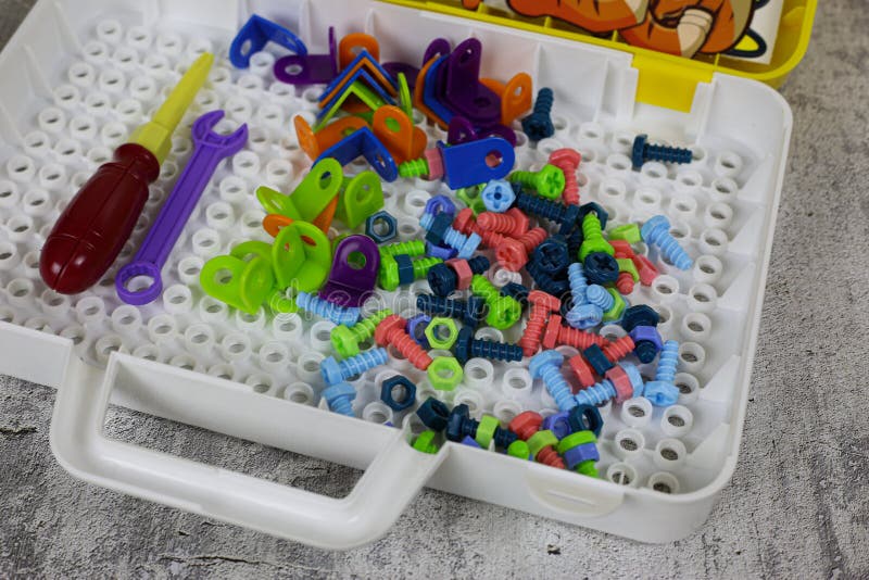 Plastic Multi-colored Cogs and Screws for Child Stock Photo - Image of ...