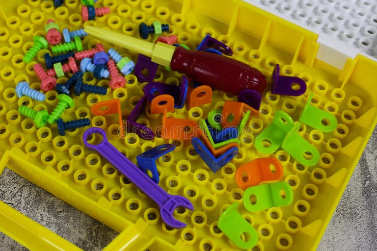 Plastic Multi-colored Cogs and Screws for Child Stock Image - Image of ...
