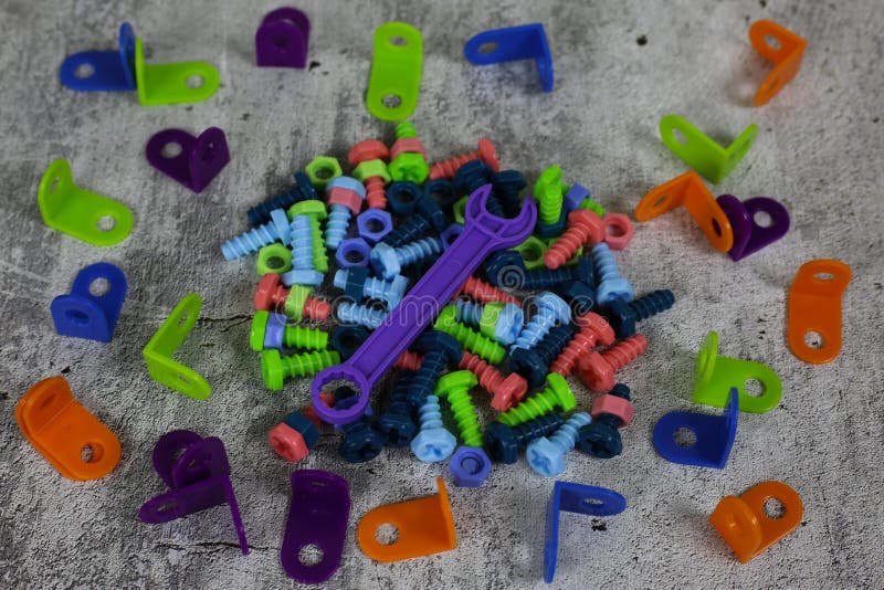 Plastic Multi-colored Cogs and Screws for Child Stock Photo - Image of ...