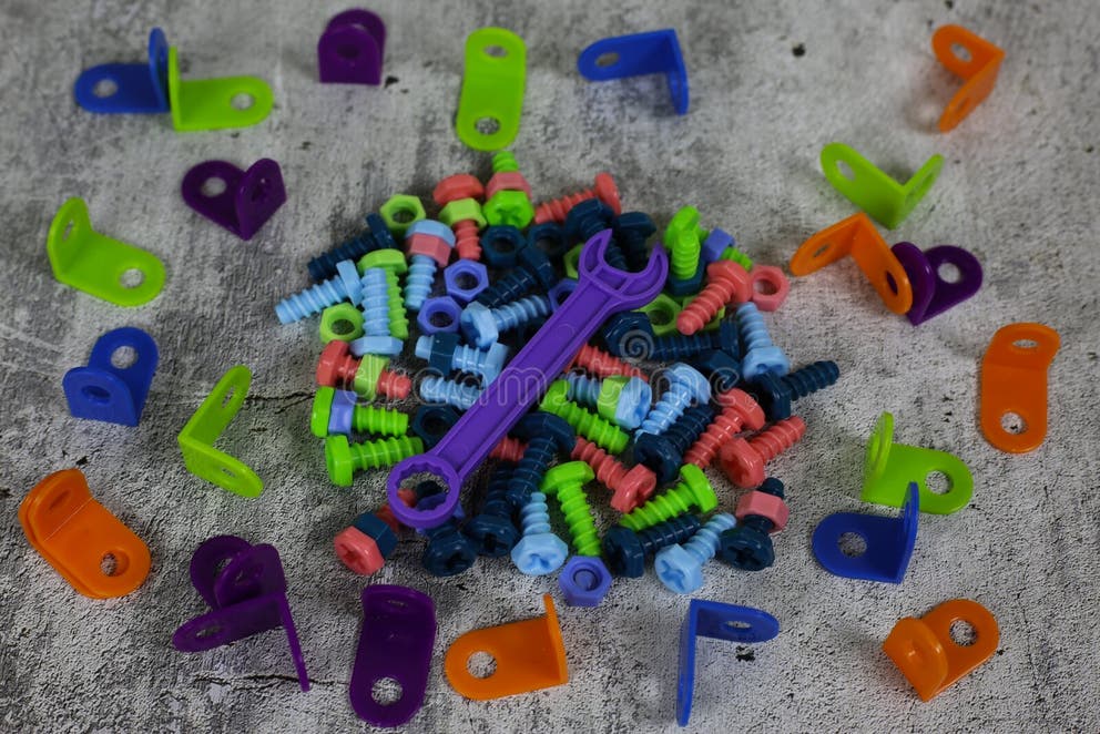 Plastic Multi-colored Cogs and Screws for Child Stock Photo - Image of ...
