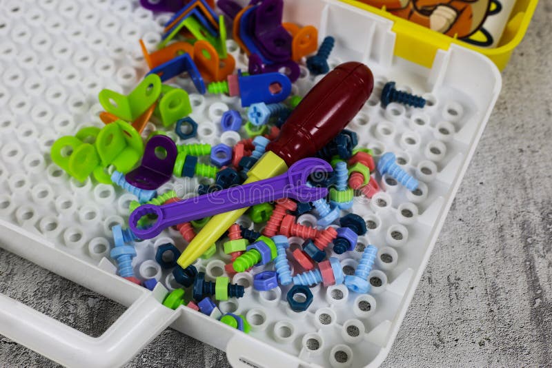 Plastic Multi-colored Cogs and Screws for Child Stock Photo - Image of ...