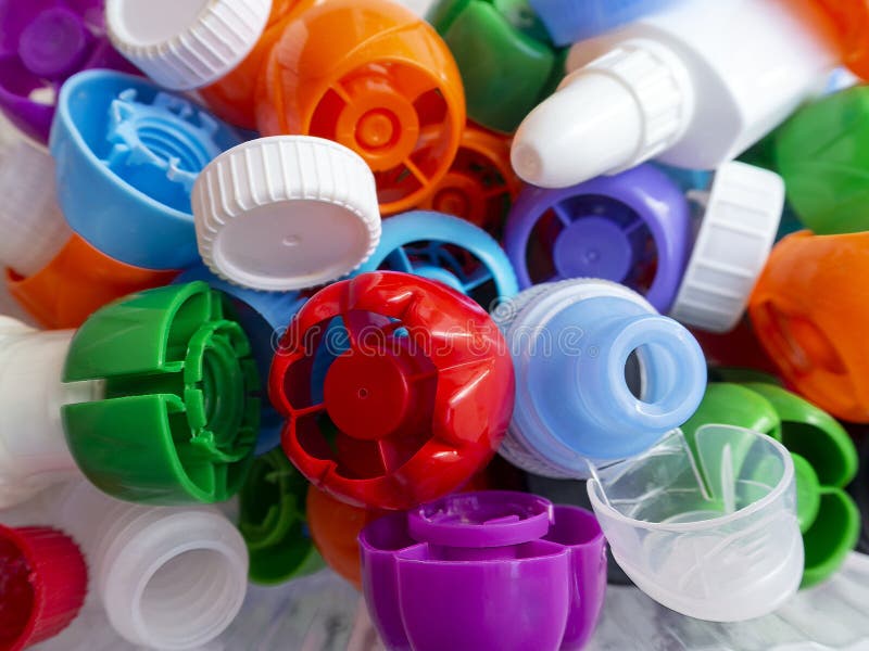 Plastic Multicolored Bottle Caps in a Pile. the Concept of Collecting ...