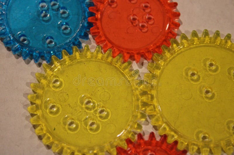 Plastic Multicoloured Gear Cogs, White Background Stock Image - Image ...
