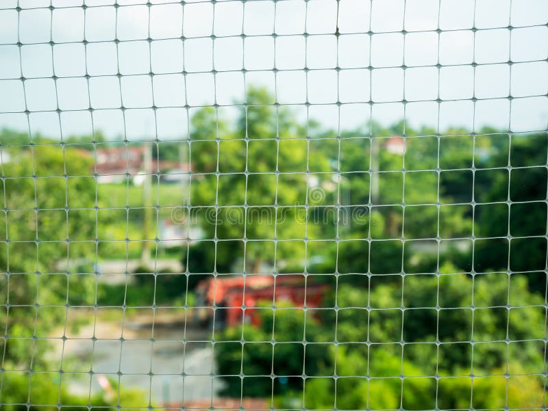 Plastic Net with Garden Background Stock Image - Image of foreground ...
