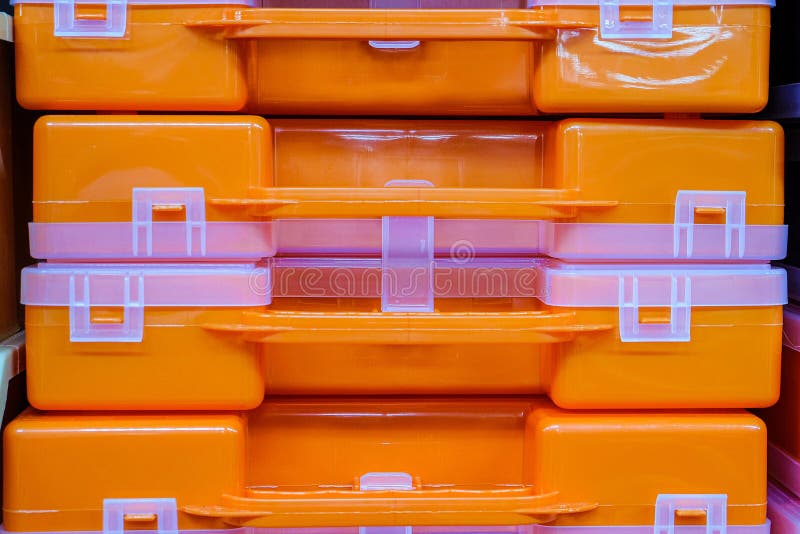Plastic Orange Tool Boxes on Store Shelves. Stack of Organizers Close ...