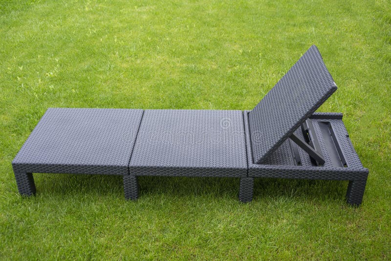 Plastic Outdoor Rattan Bed on a Lawn Stock Image - Image of beautiful ...