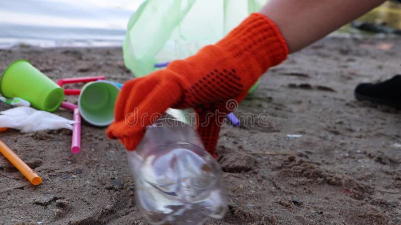 Garbage Collection on the Beach. Plastic and Packages Scattered on the ...