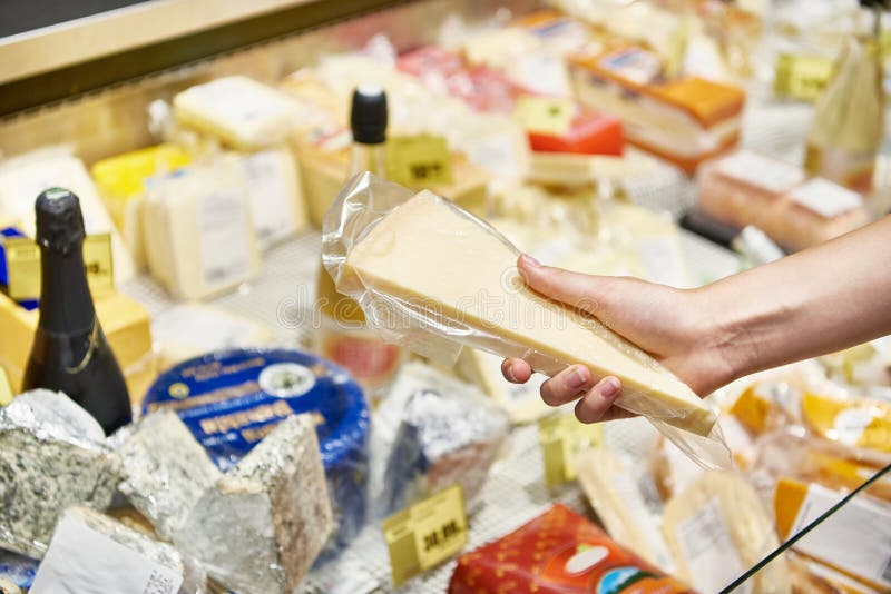 Plastic Packaging with Hard Cheese in Store Stock Photo - Image of milk ...