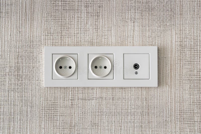 Plastic Panel with Electrical Sockets and Cable Connectors on the Wall ...
