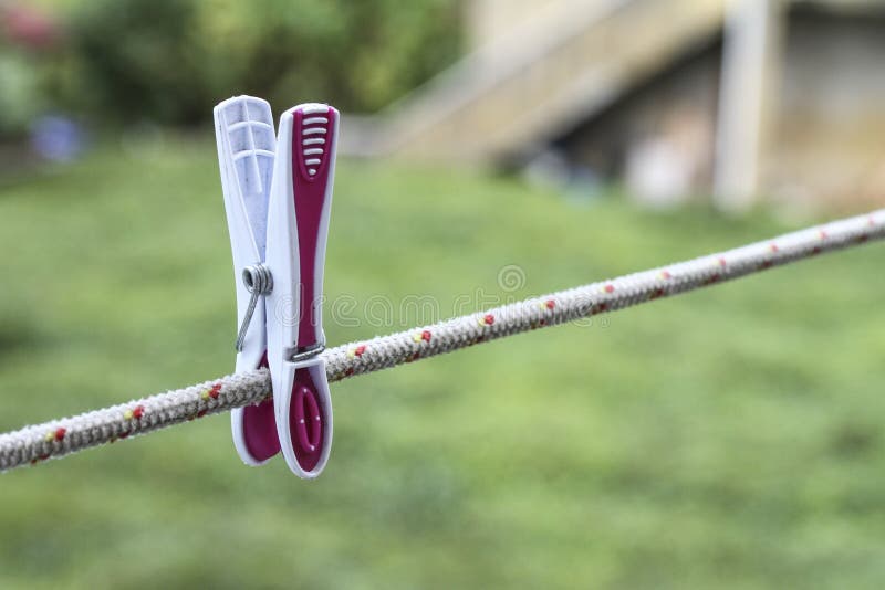 The Plastic Pegs on the Rope Stock Image - Image of group, hanging ...