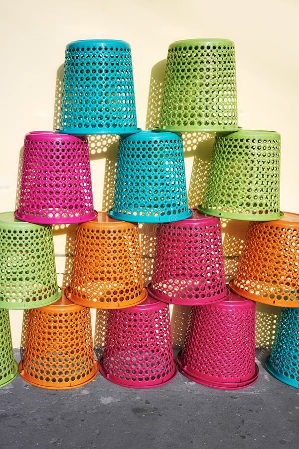 Plastic Perforated Baskets Lined Up Against the Wall Stock Photo ...