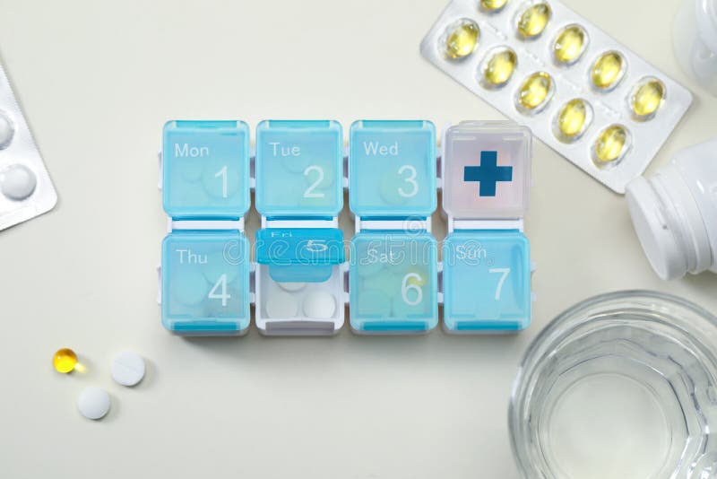 Plastic Pill Box and Different Medicaments on White Table, Flat Lay ...