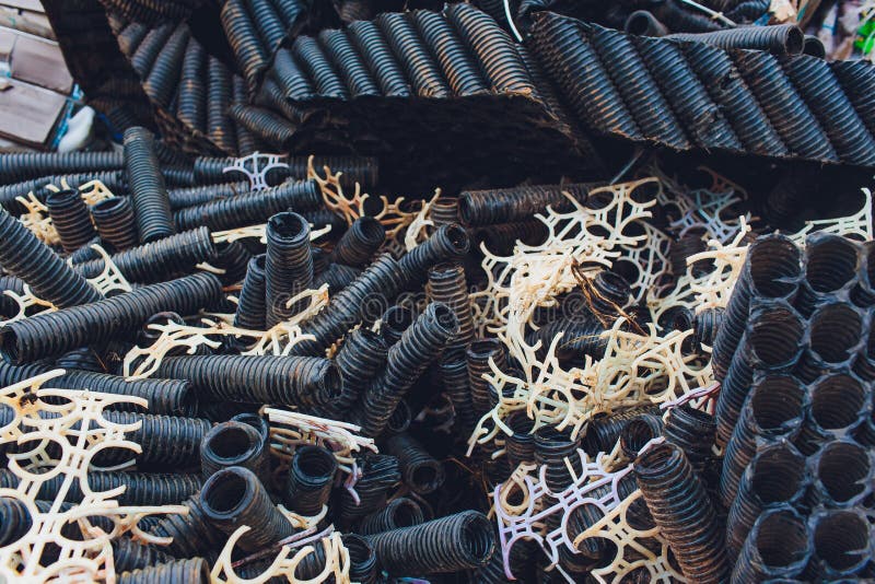 Plastic Pipe and Materials for Constructions Waste Sorting. Stock Image ...
