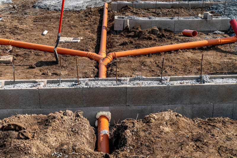 Plastic Pipe for Sewage Network in the Base Plate at the Construction ...