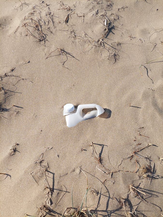 Plastic Pollution Problems. Plastic Bottle in the Sand on the Beach ...