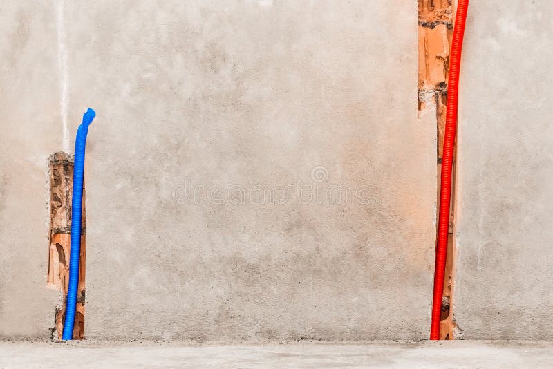 Plastic PVC Pipe Insulation Material on Construction Concrete Home Wall ...