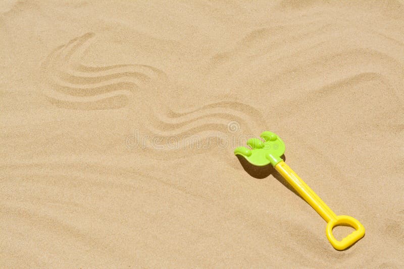 Plastic Rake on Sand, Space for Text. Beach Toy Stock Image - Image of ...