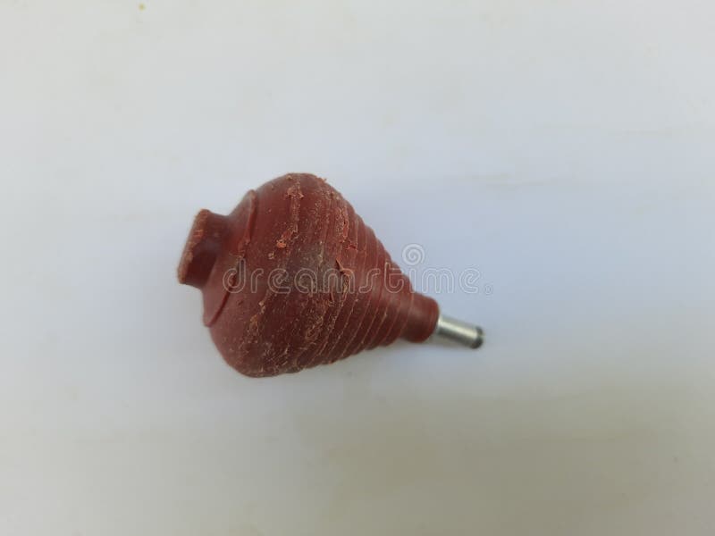 Plastic Red Color Spinning Top of Buguri with Black Thread on White ...