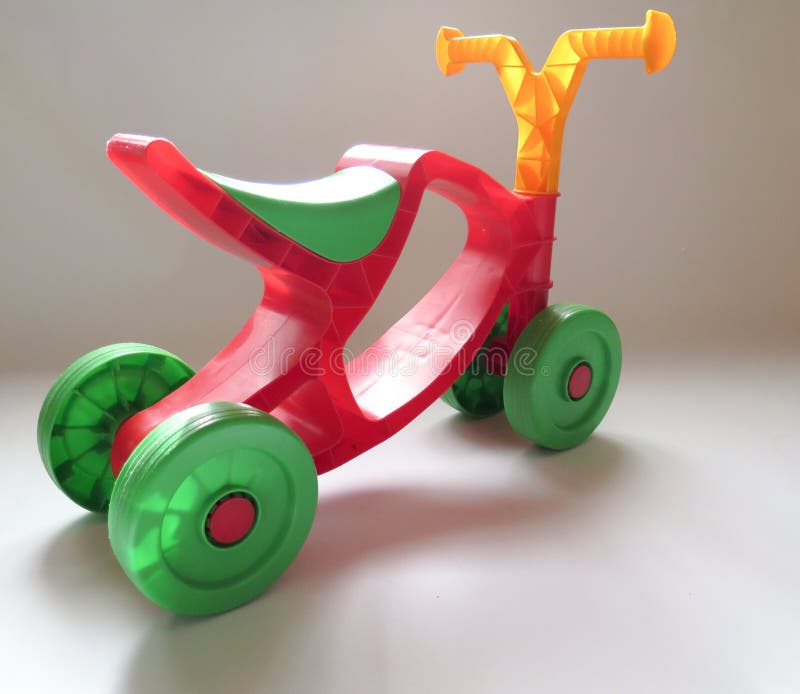Plastic Red with Green Bicycle for Kids Stock Photo - Image of green ...