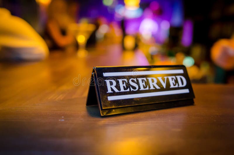 Plastic Reserved Plate on an Arranged Restaurant Table Stock Photo ...