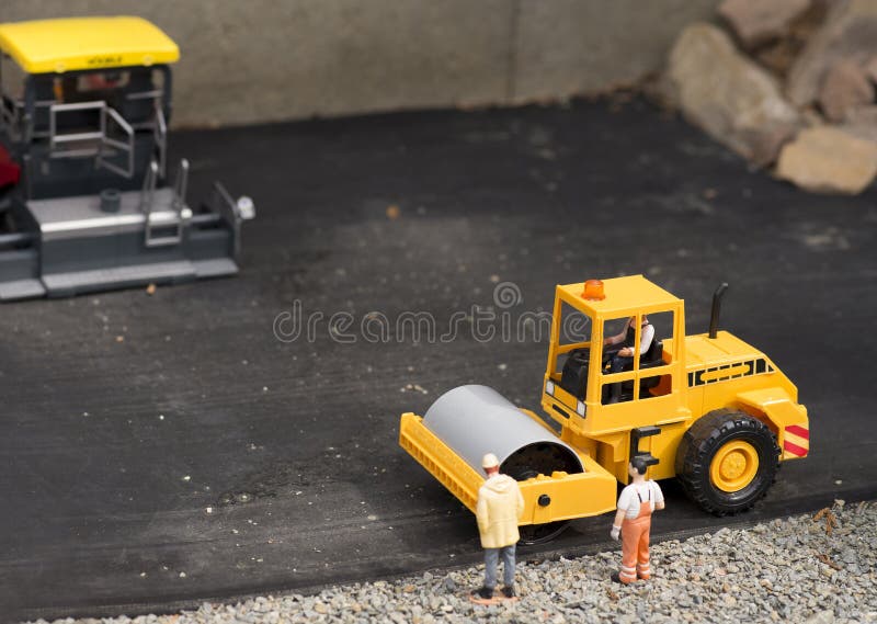 Plastic Road Roller Toy with Persons Stock Image - Image of engineering ...