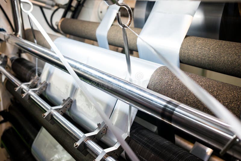 Plastic Rolls Inside Plastic Packaging Factory with Industrial Machine ...