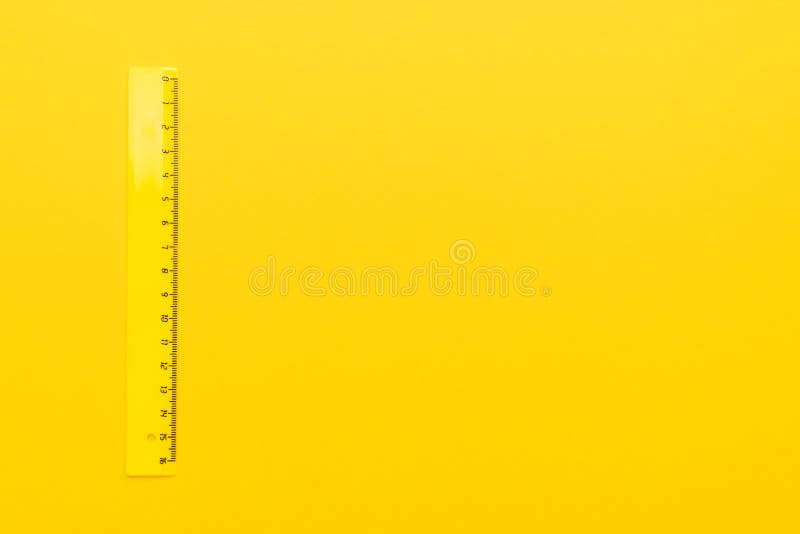 Yellow Plastic Ruler on the Yellow Background Stock Image - Image of ...