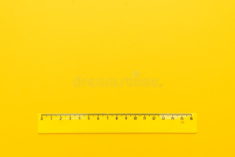 Yellow Plastic Ruler on the Yellow Background Stock Photo - Image of ...