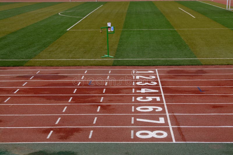 Plastic Runway in a Sports Ground Stock Photo - Image of green, damp ...