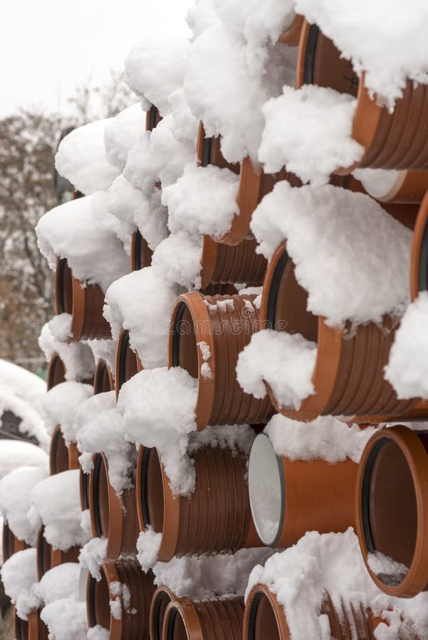 Plastic Sewer Pipes at a Construction Site in the Snow. Stock Photo ...