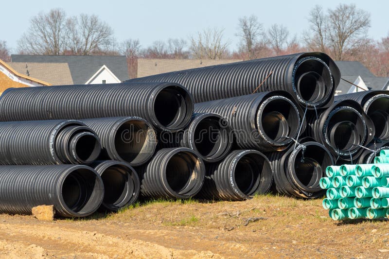 Plastic Sewer Pipes at a Construction Site Stock Photo - Image of sewer ...