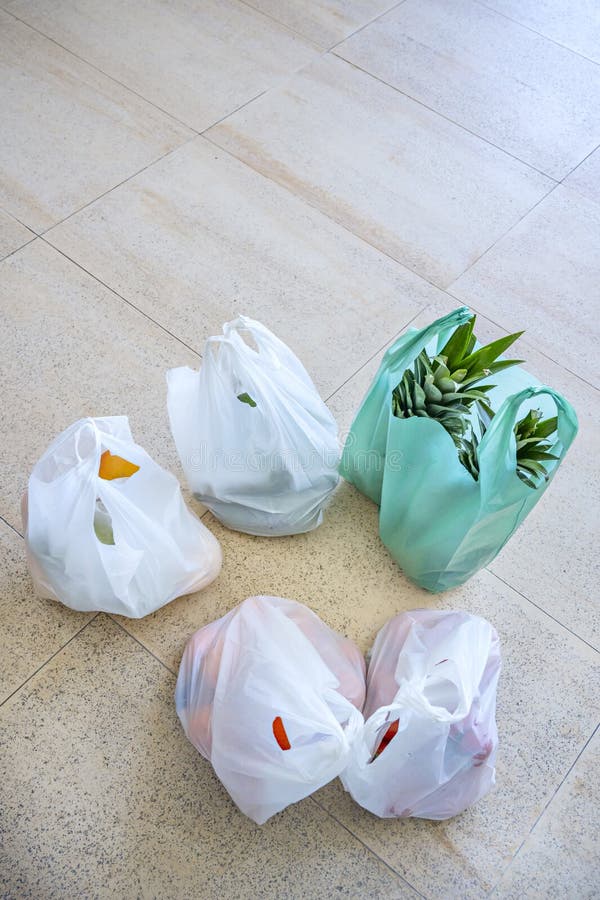 Plastic Shopping Bags Filled with Fruit Stock Photo - Image of ...