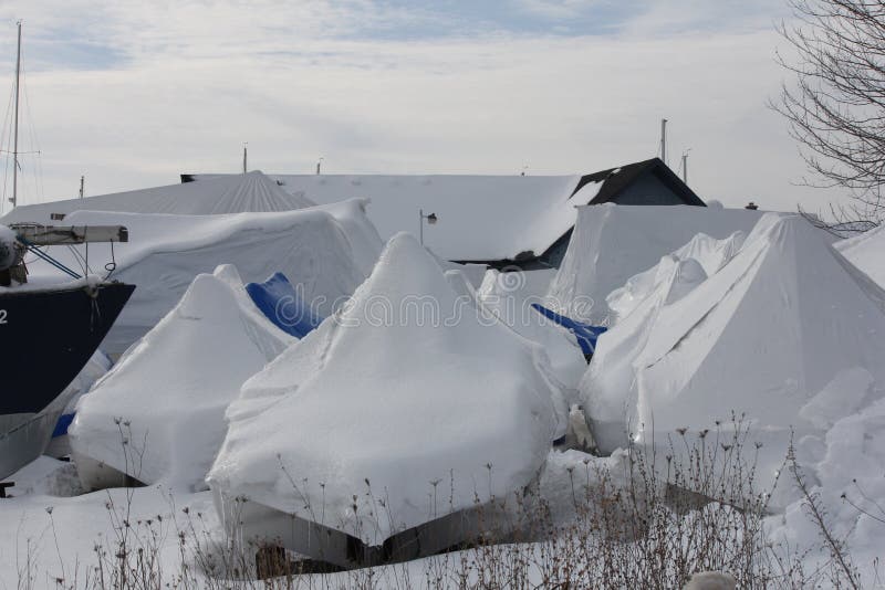 Boats with Snow and Shrink Wrap Editorial Photo - Image of storage ...
