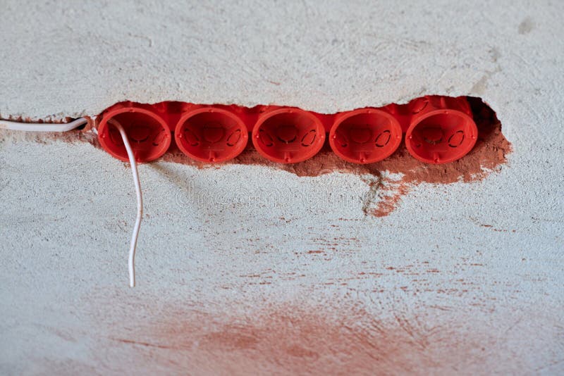 Plastic Socket Boxes and Electrical Wires on Plastered Wall Stock Photo ...