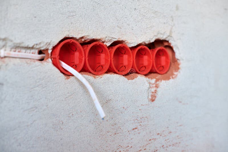 Plastic Socket Boxes and Electrical Wires on Plastered Wall Stock Photo ...