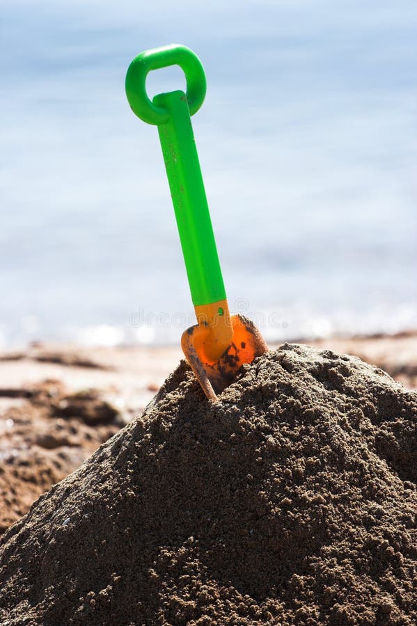 Plastic spade stock photo. Image of childhood, coast - 10041886